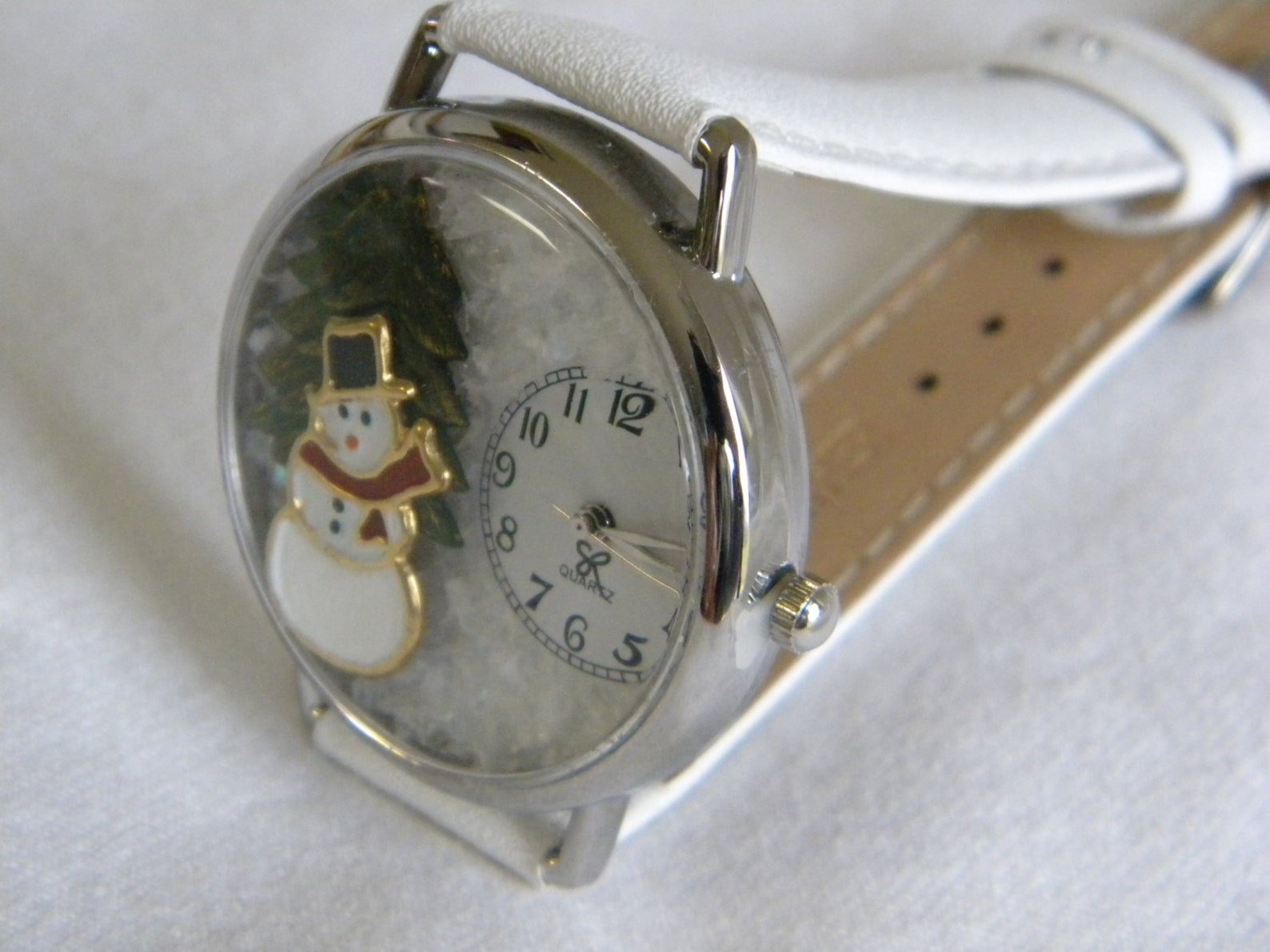 Snowman Watch With Evergreen Tree and Snowy Background, Winter ...