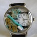 Dentist or Dental Hygienist Watch With Floss Toothbrush and Toothpaste ...