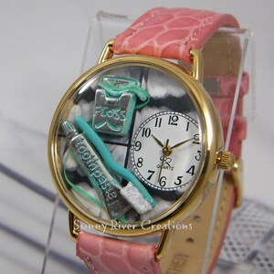 Dentist or Dental Hygienist Watch With Floss Toothbrush and Toothpaste ...