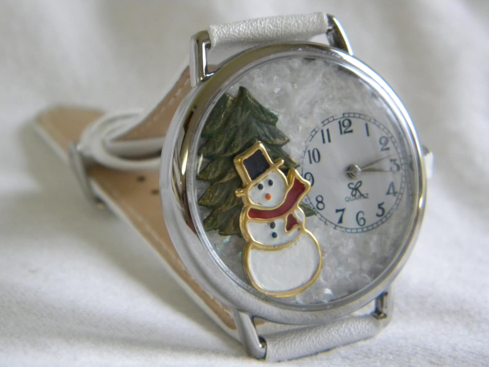 Snowman Watch With Evergreen Tree and Snowy Background, Winter ...