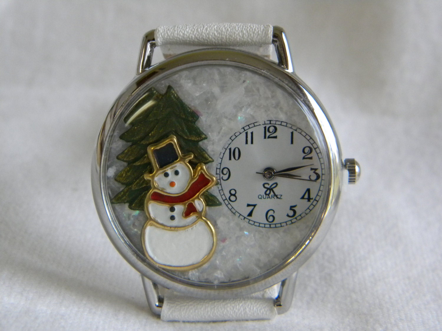 Snowman Watch With Evergreen Tree and Snowy Background, Winter ...