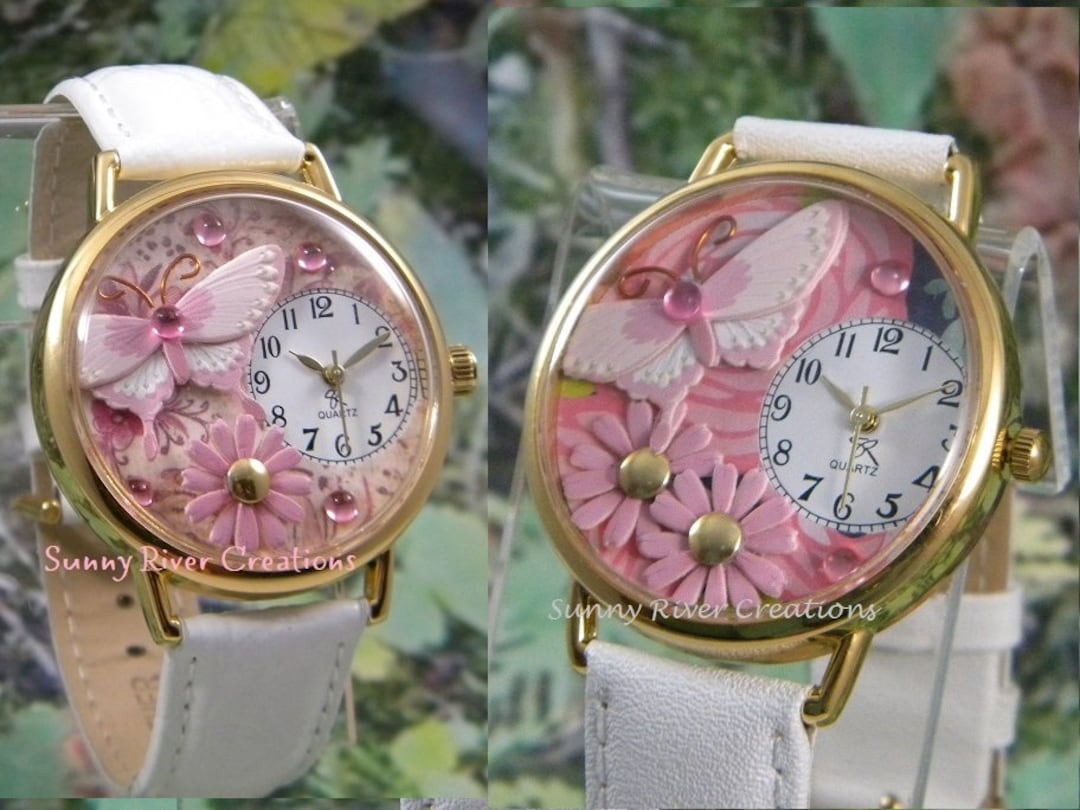 Beautiful Pink Butterfly Watch With Pink Flowers Floral Background ...