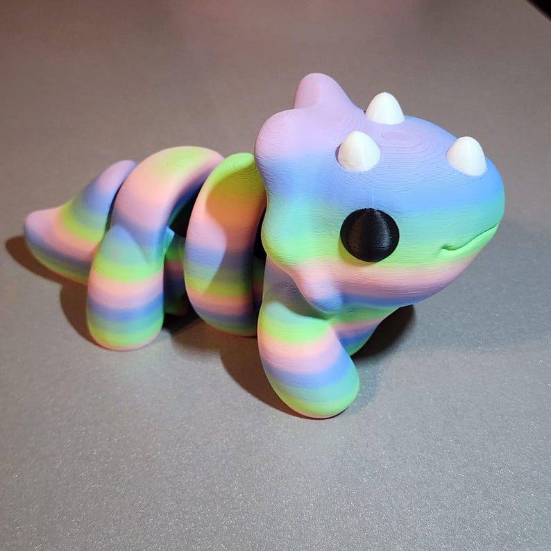 3D Printed Rainbow Dinosaur Trio: Articulated Fidget Toys - Etsy