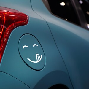 Decal With Smiley Face on Gas Tank Door - Emoji Craving Tasty Fuel ...