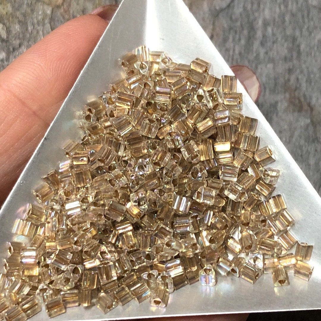 8/0 Triangle Seed Beads by Toho - Gold Lined Rainbow Crystal Toho # 994 ...