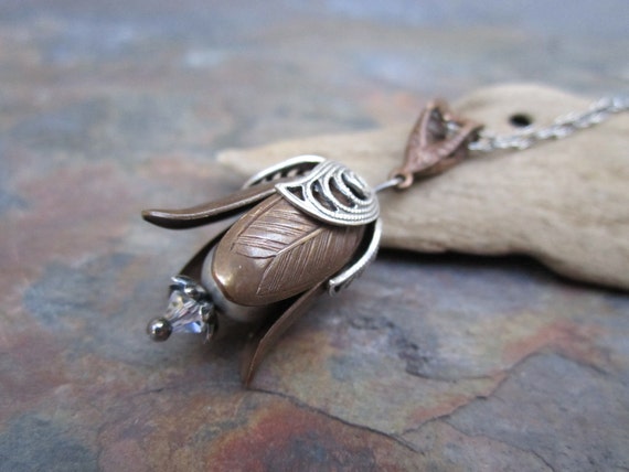 Items similar to Pixie Bells of Ireland Necklace on Etsy