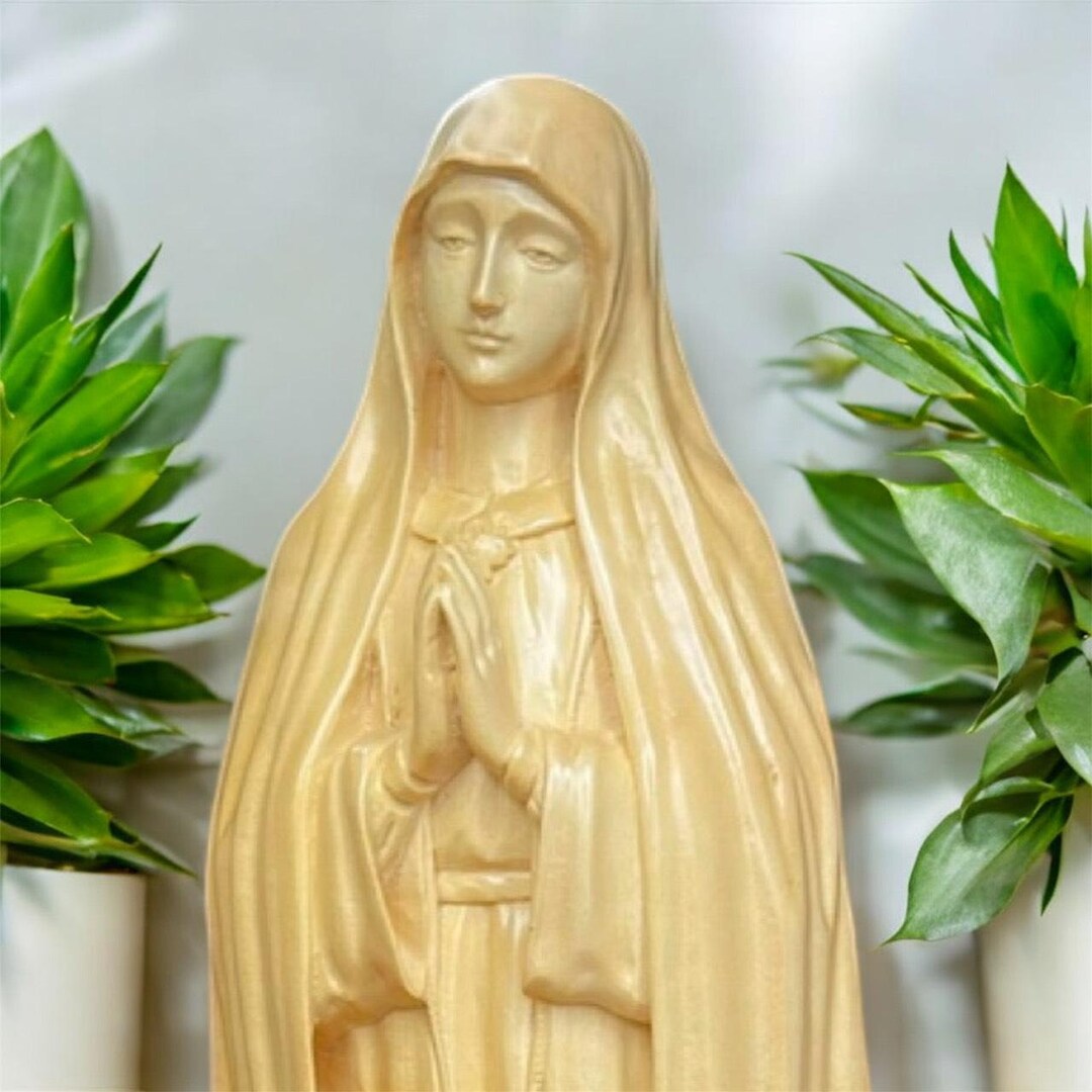 A Beautiful Wooden Statue of Our Lady of Fatima is Not Only a Work of ...
