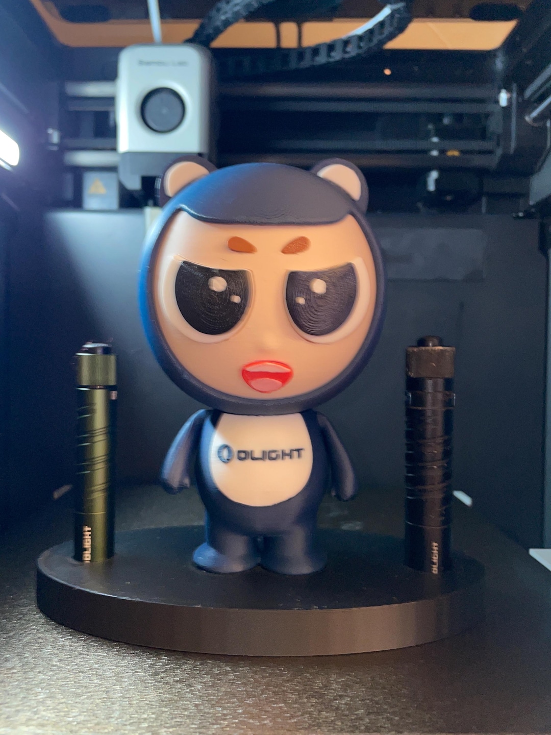 Olight OMASCOT Articulated Action Figure With Base That Holds Figure ...