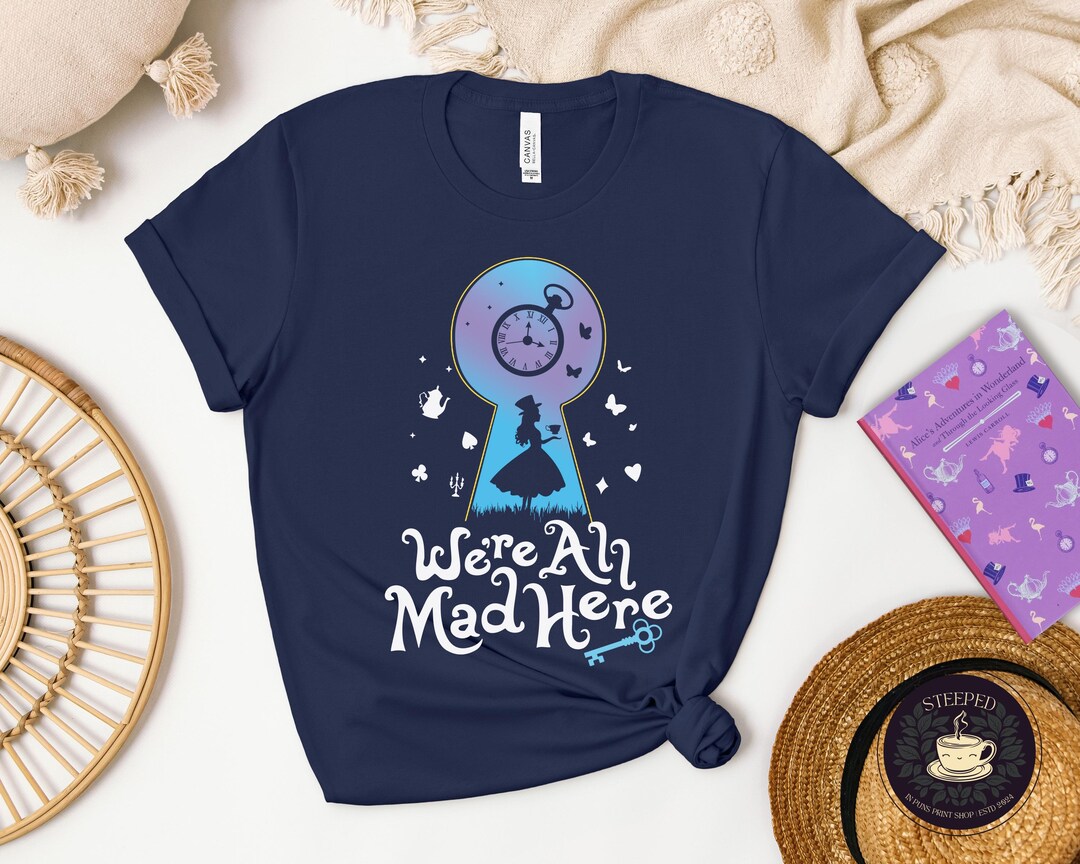 We're All Mad Here is a Whimsical Design Available on T-shirts and ...