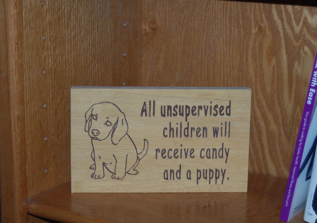 All Unsupervised Children Will Receive Candy and a Puppy. - Hand ...