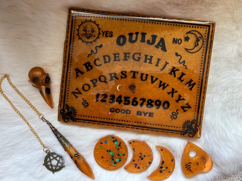 Gold and Black Ouija Board With Matching Planchette, Pendulum, Crow ...