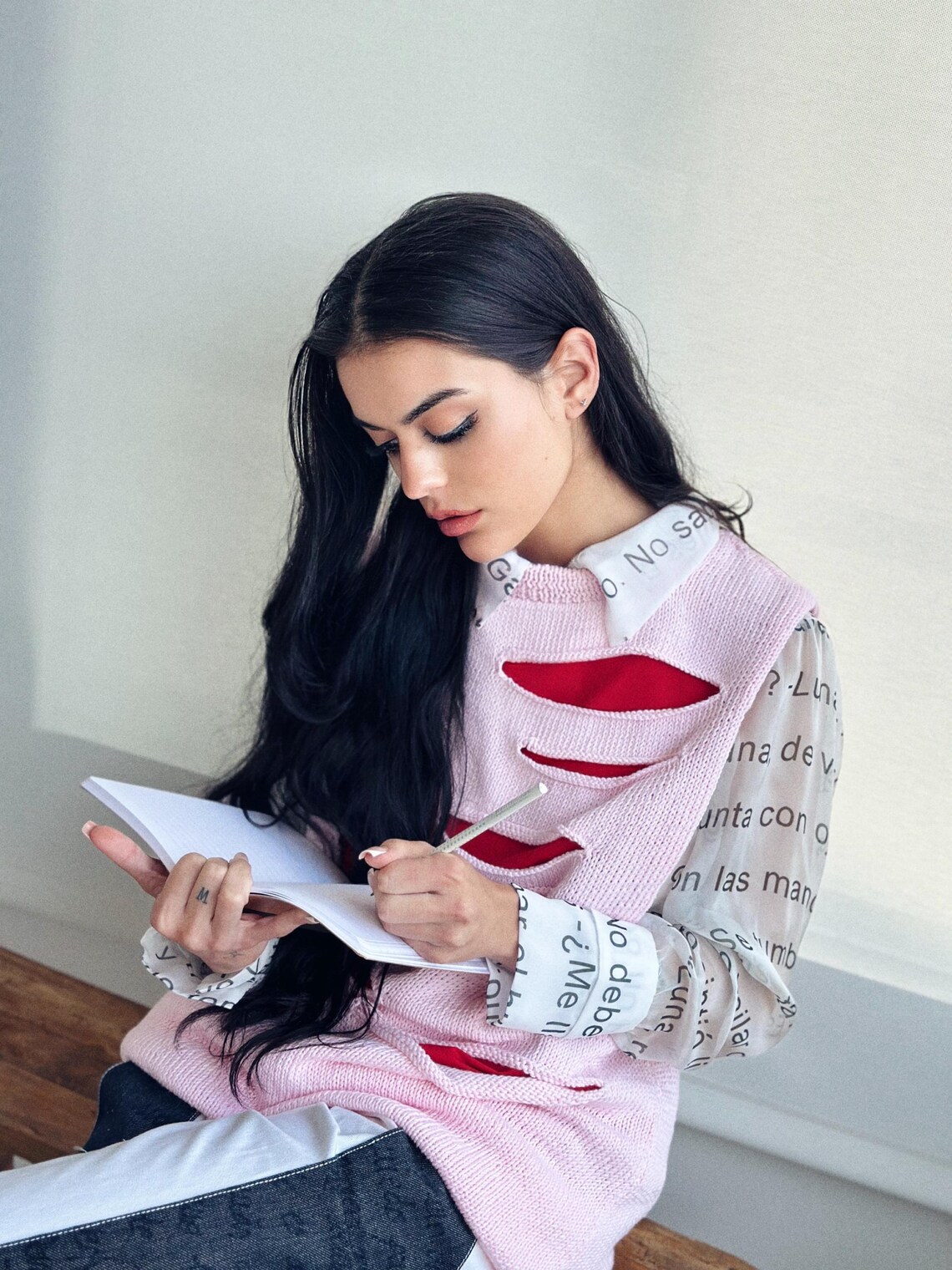 Wide Knit Sleeveless Vest With Cutouts Revealing 'wound' Unique ...