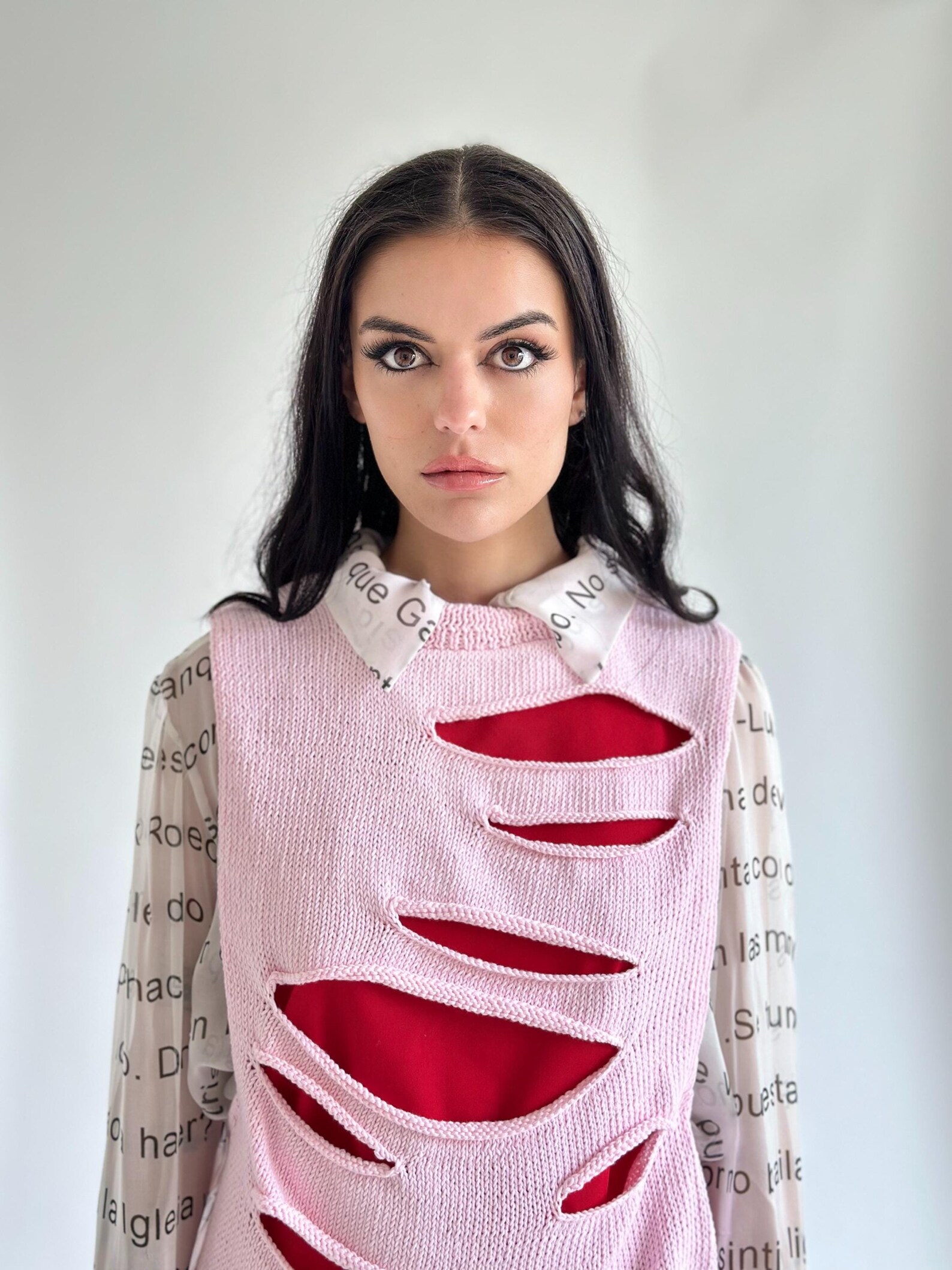 Wide Knit Sleeveless Vest With Cutouts Revealing 'wound' Unique ...