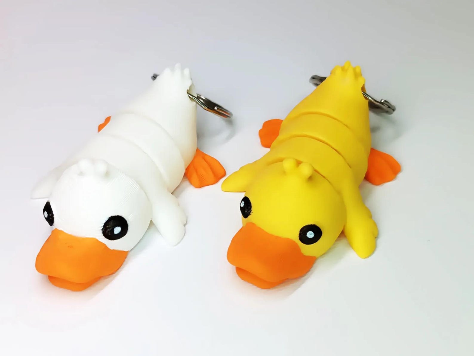 Cute Flexi Animals Keychain - Etsy