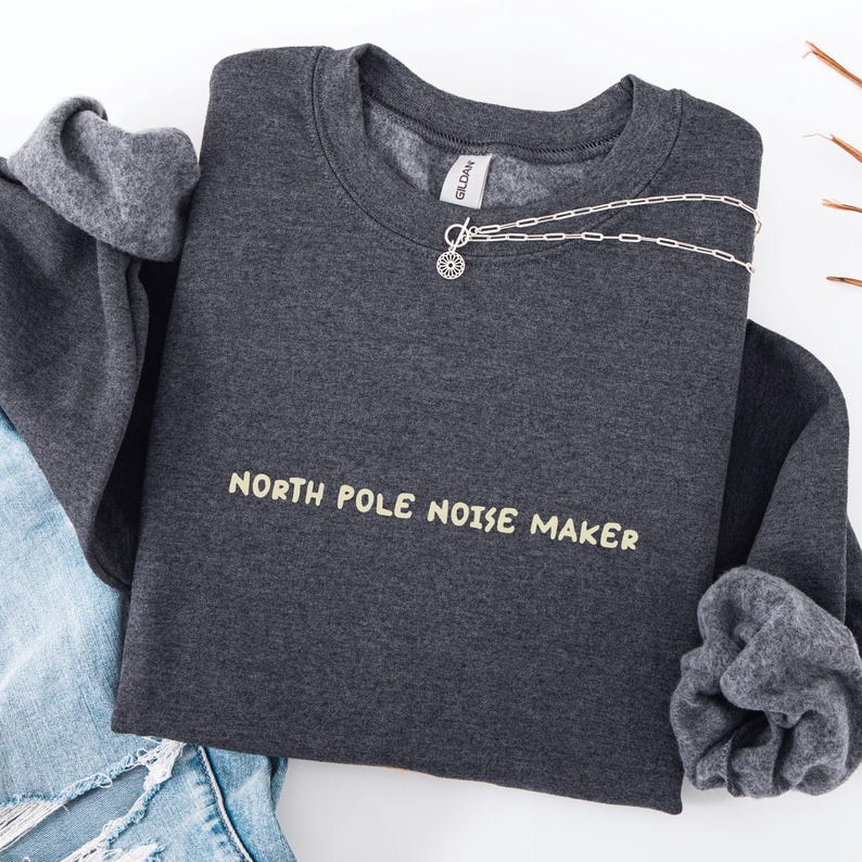 North Pole Noise Maker Christmas Shirt: Funny Holiday Tee for Kids and ...