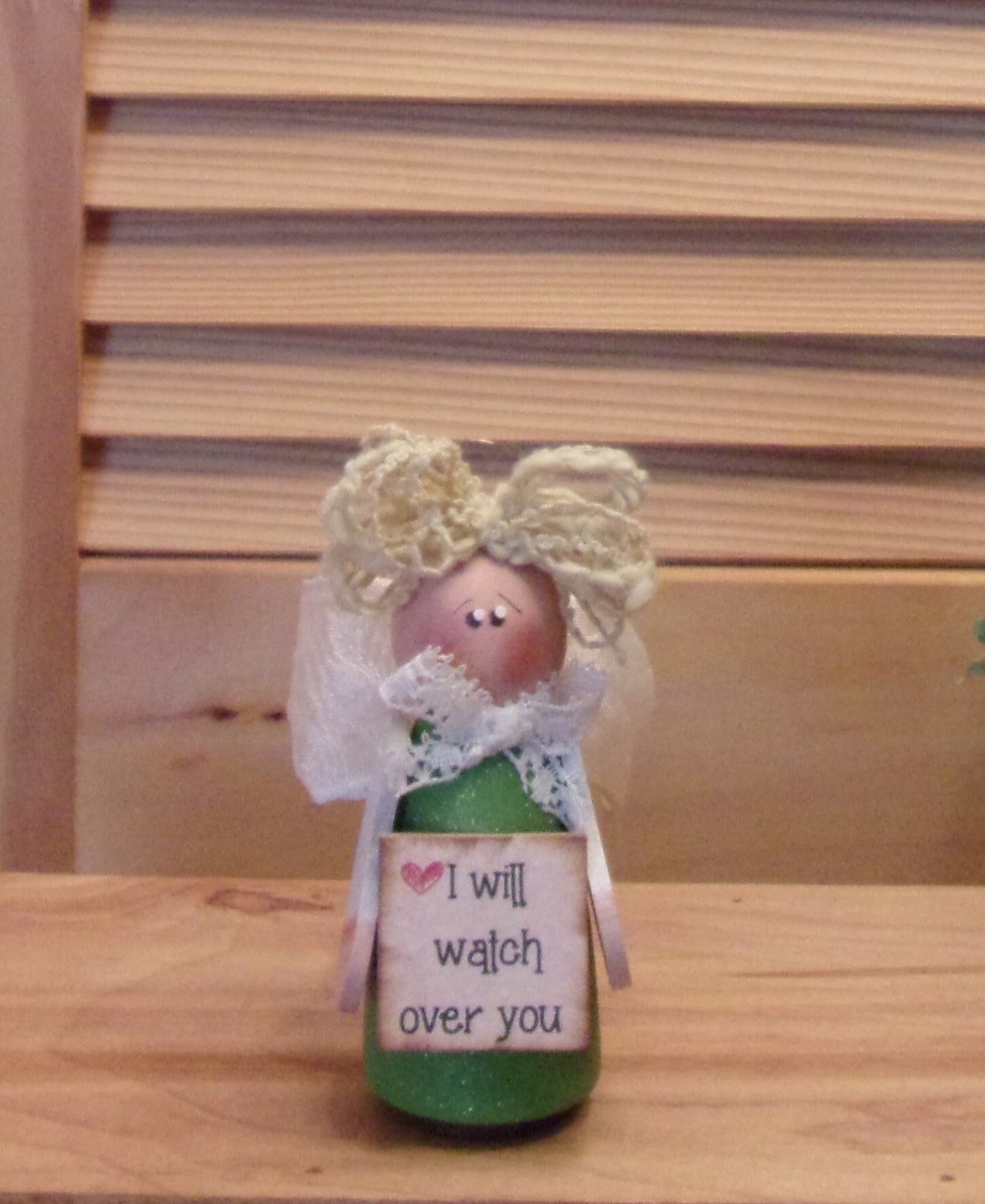 Emma Angel Holding i Will Watch Over You Inspirational Sign Windowsill ...