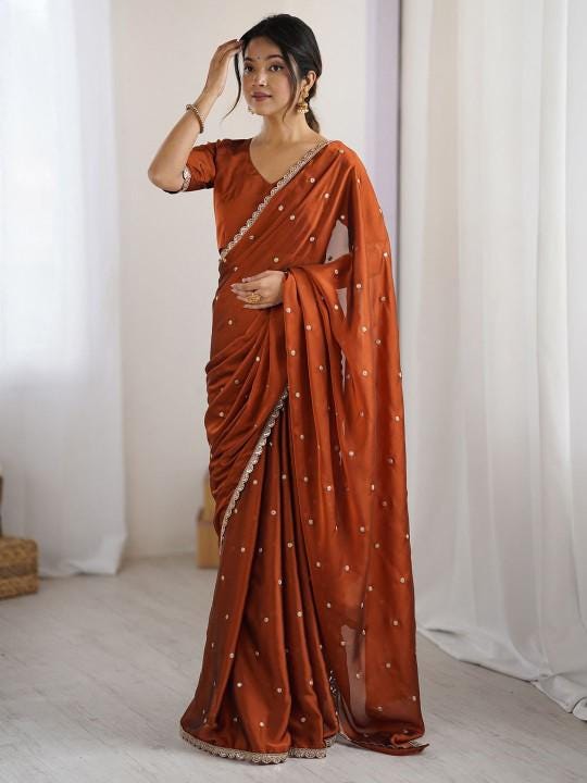 Rust Sequinned Embellished Pure Georgette Saree With Embroidered Border ...