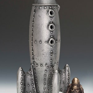 Moon Rocket Coin Bank With One Spaceman - Item #924, Cast Aluminum and ...