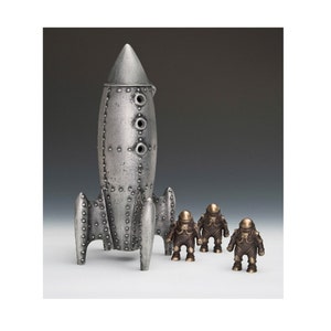 Moon Rocket Coin Bank With One Spaceman - Item #924, Cast Aluminum and ...