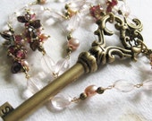 Items similar to Antique brass key necklace pink quartz red garnet and ...