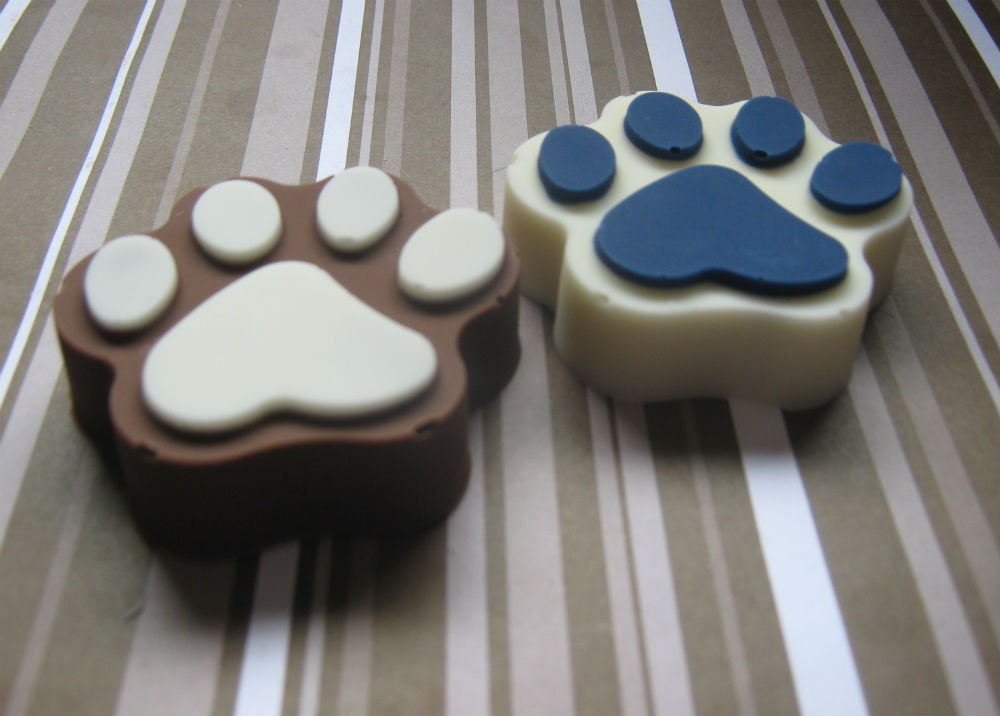 One dozen solid chocolate paw print candy pieces party favors | Etsy