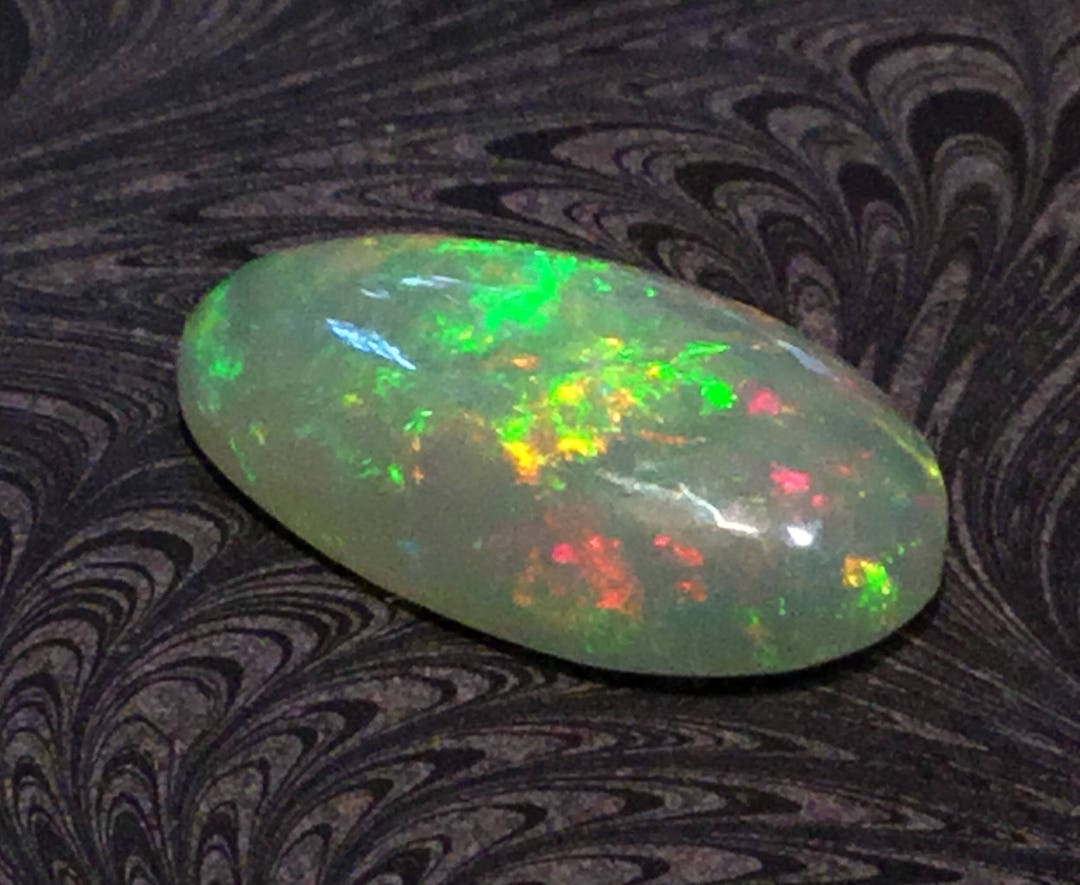 Opal Shown in a Blue Wax Pendent Deep Colors 6.15 Ct. Ethiopian Opal ...