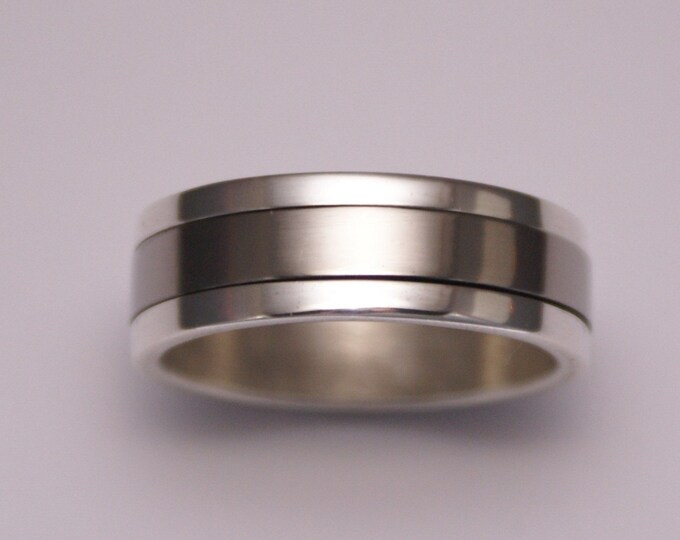 Silver and Titanium Spinning Rings - Etsy
