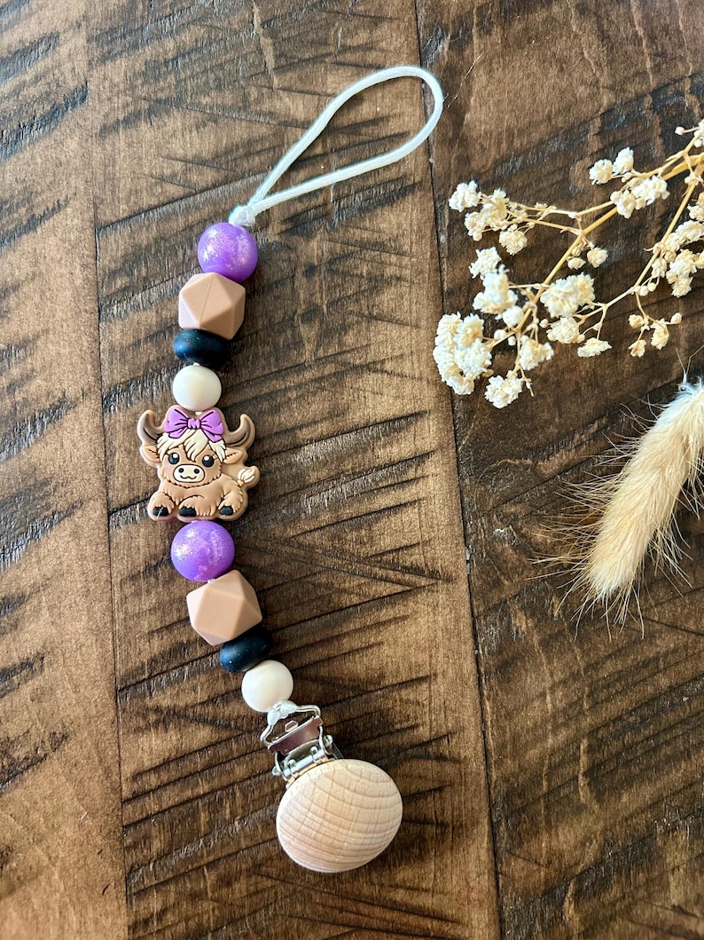 HIGHLAND Cow, Baby Girl Pacifier Clip, Purple Bow Neutral Accessory ...