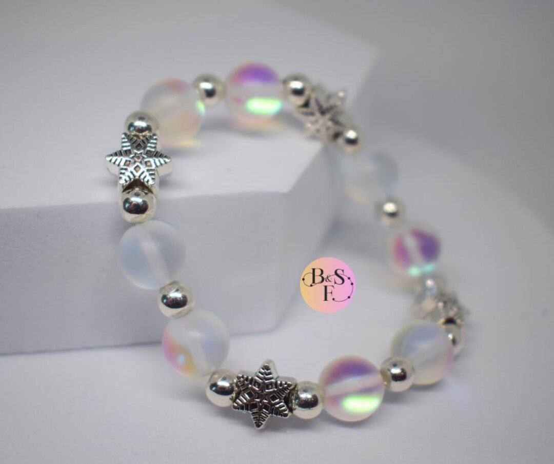 Silver Snowflake Aurora Winter Stretch Bracelet | Opalescent Beaded ...