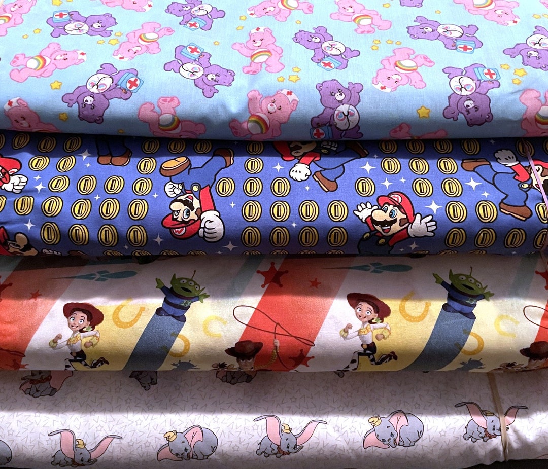 Character Fabrics #10, Care Bears, Nintendo, Toy Story, Dumbo, Sold ...