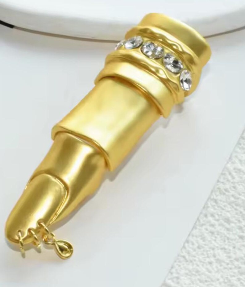 Schiaparelli Inspired Nail Ring - Etsy