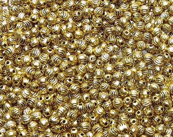 Antique gold beads | Etsy