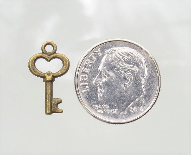 Tiny Skeleton Key 15x9x2mm Antique Brass Alloy Metal - Etsy