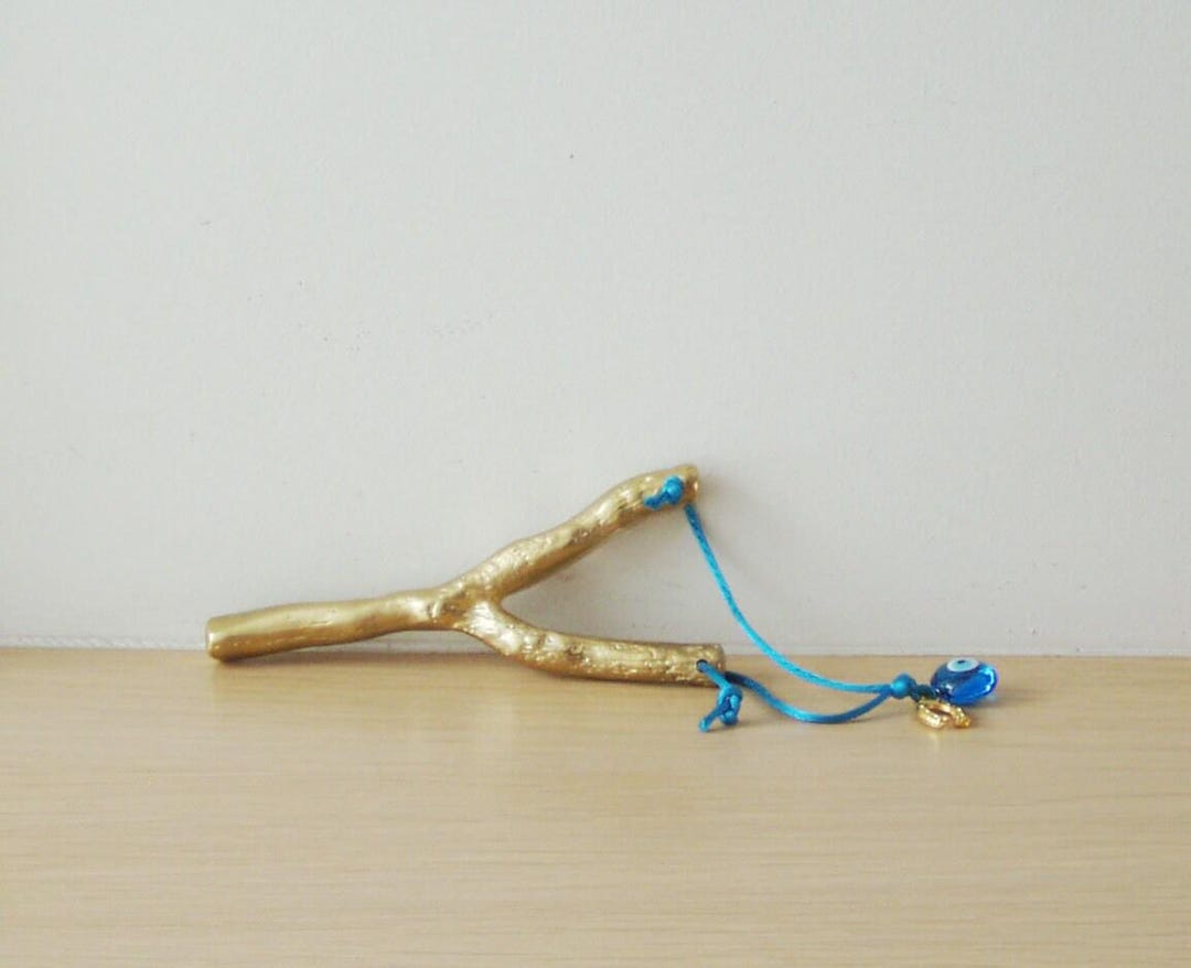 Gold Slingshot Sculpture, Life Size Brass Slingshot With Turquoise Cord ...