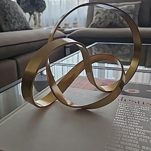 Creative Gold Crafts Knot Golden Line Hollow Out Metal Figurine Winding ...