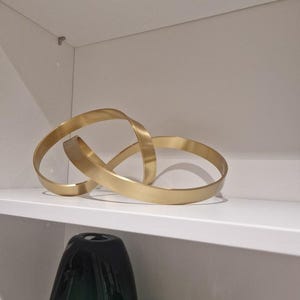 Creative Gold Crafts Knot Golden Line Hollow Out Metal Figurine Winding ...