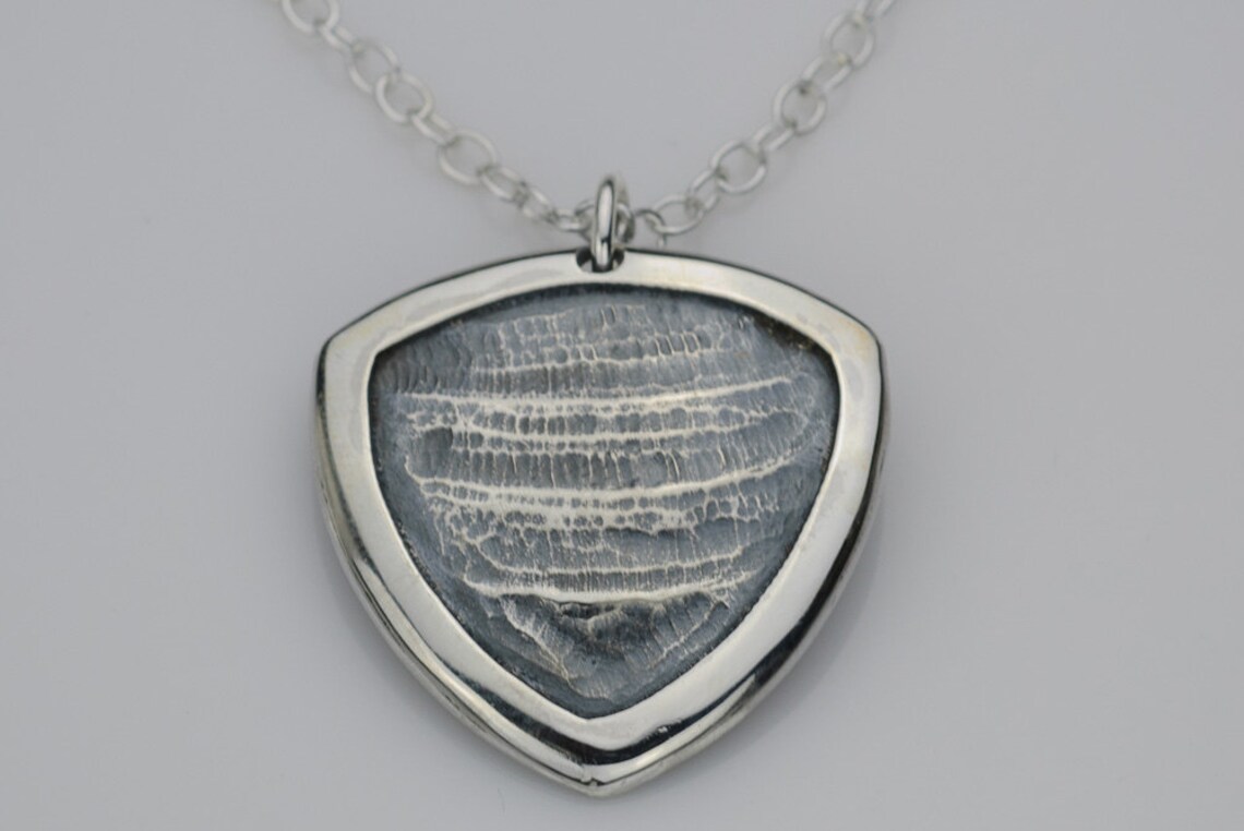 Carved Silver Triad Pendant - Etsy