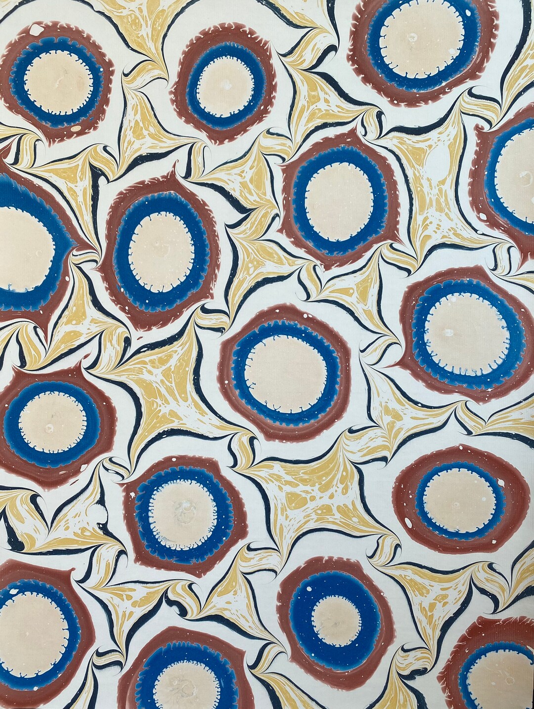 Marbled Paper Composed of Stylized Flowers Floating on a Field of ...
