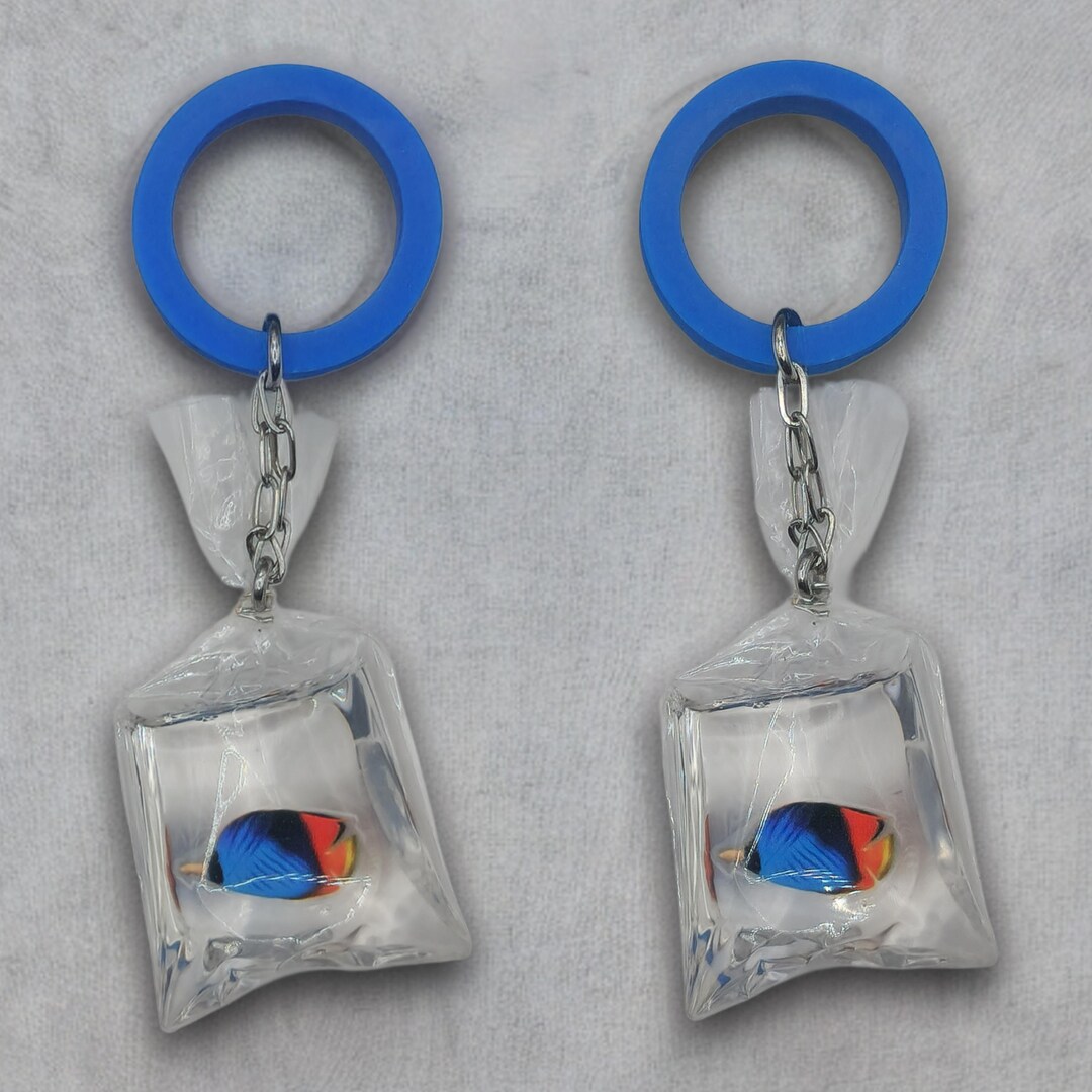 Kitsch Novelty Tunnels Fish in a Bag Dangle Gauges Surreal Streetwear ...