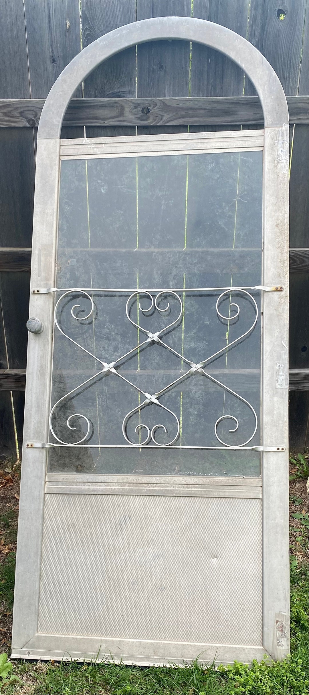 Vintage Metal Arch Exterior Storm Door With Ornate Scroll Door Guard ...