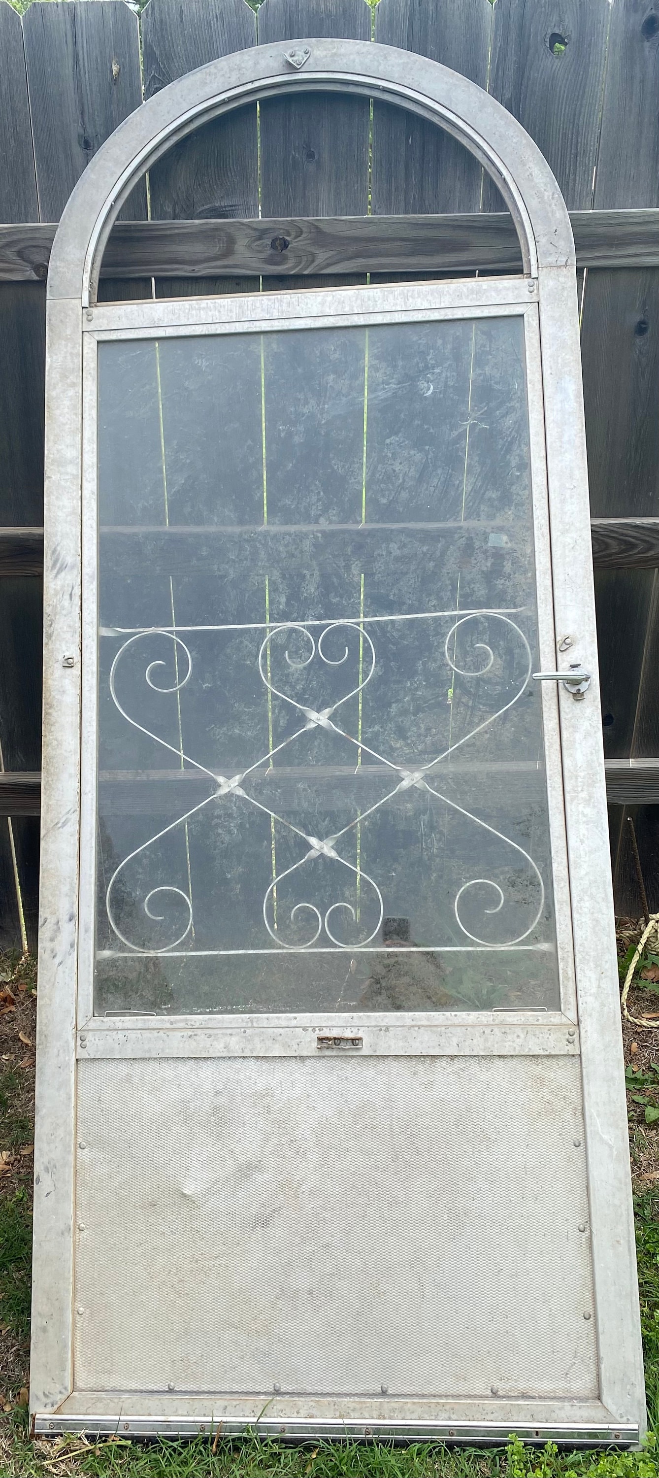 Vintage Metal Arch Exterior Storm Door With Ornate Scroll Door Guard ...
