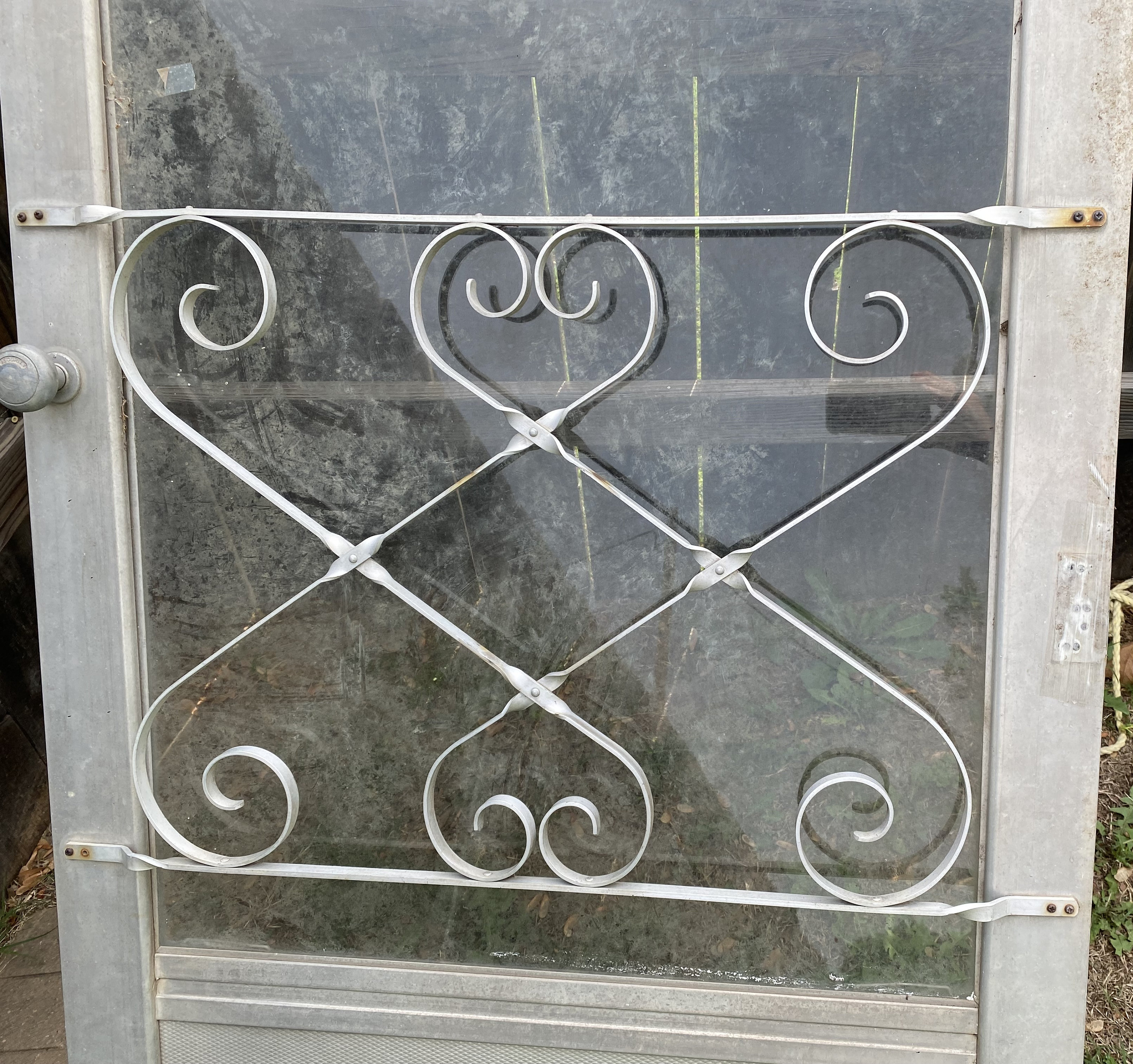 Vintage Metal Arch Exterior Storm Door With Ornate Scroll Door Guard ...