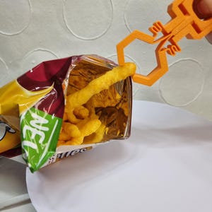Small Mechanical Fidget Grabber for Snacks – Perfect for Chips, Candy ...