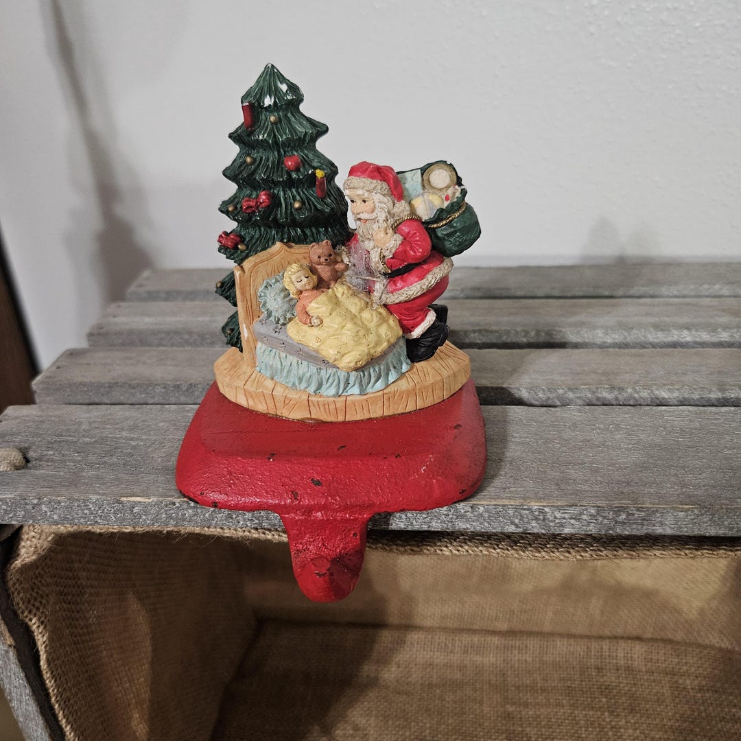 Christmas Stocking Hanger Santa With Baby Girl Mantle Stocking Holder ...