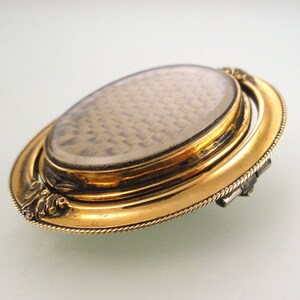 A Double Sided Victorian Hair Locket Brooch With Delicate Scroll Accent ...