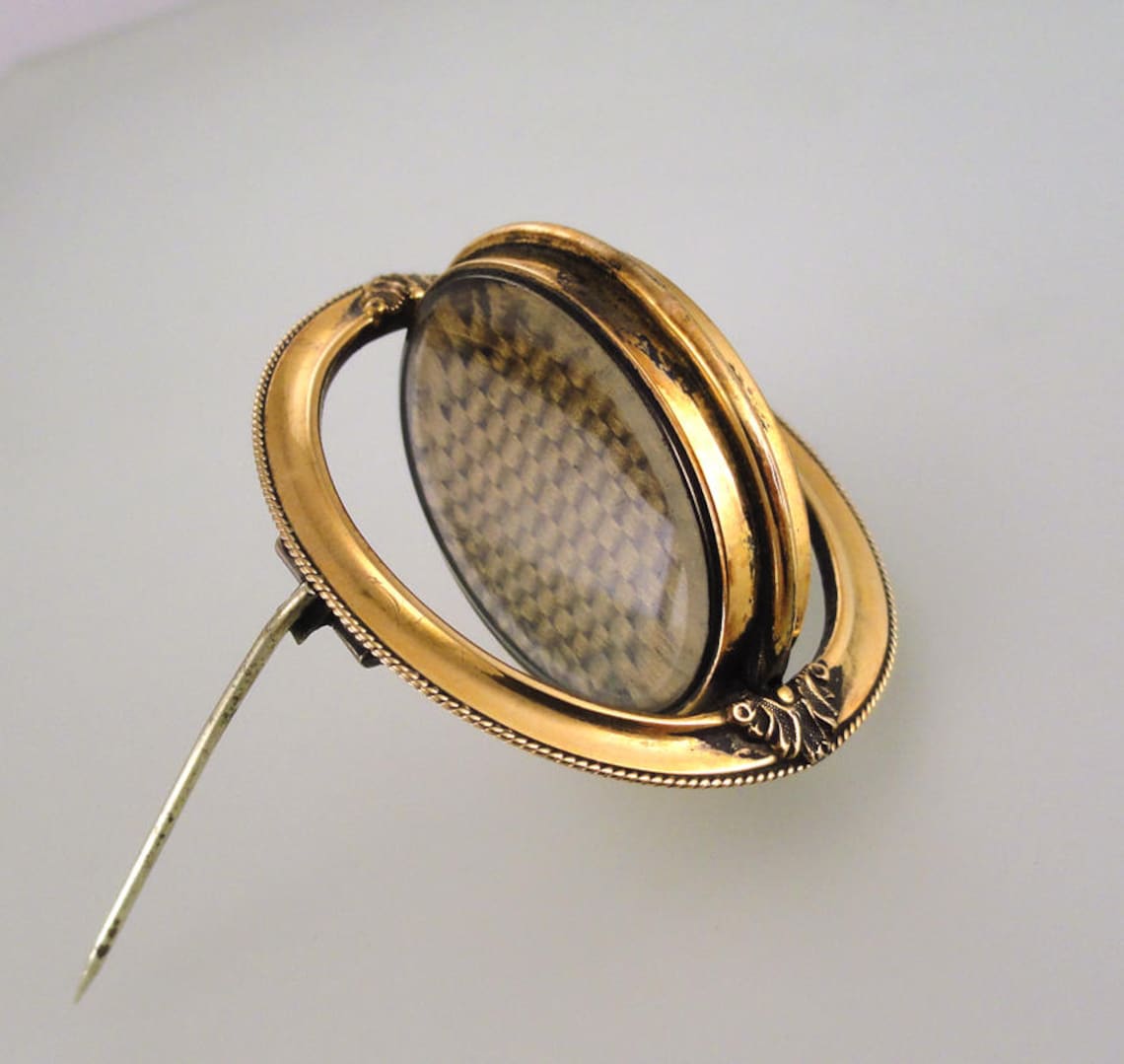 A Double Sided Victorian Hair Locket Brooch With Delicate Scroll Accent ...