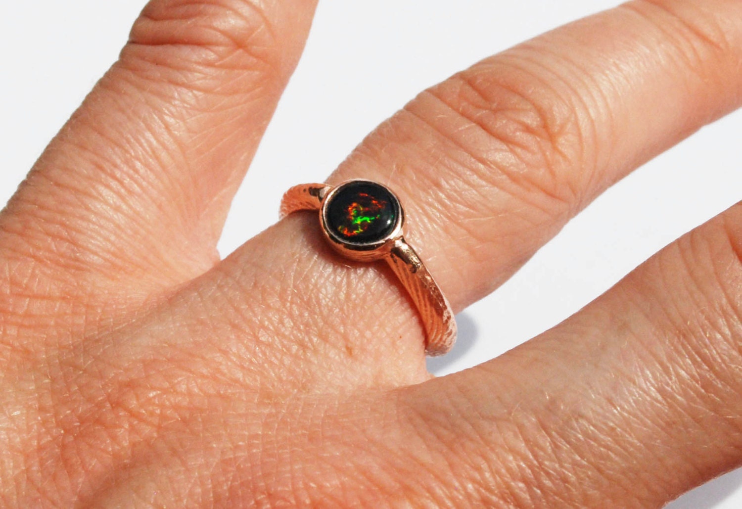 Solid Rose Gold Cuttlefish Cast and Black Opal Solitaire Ring