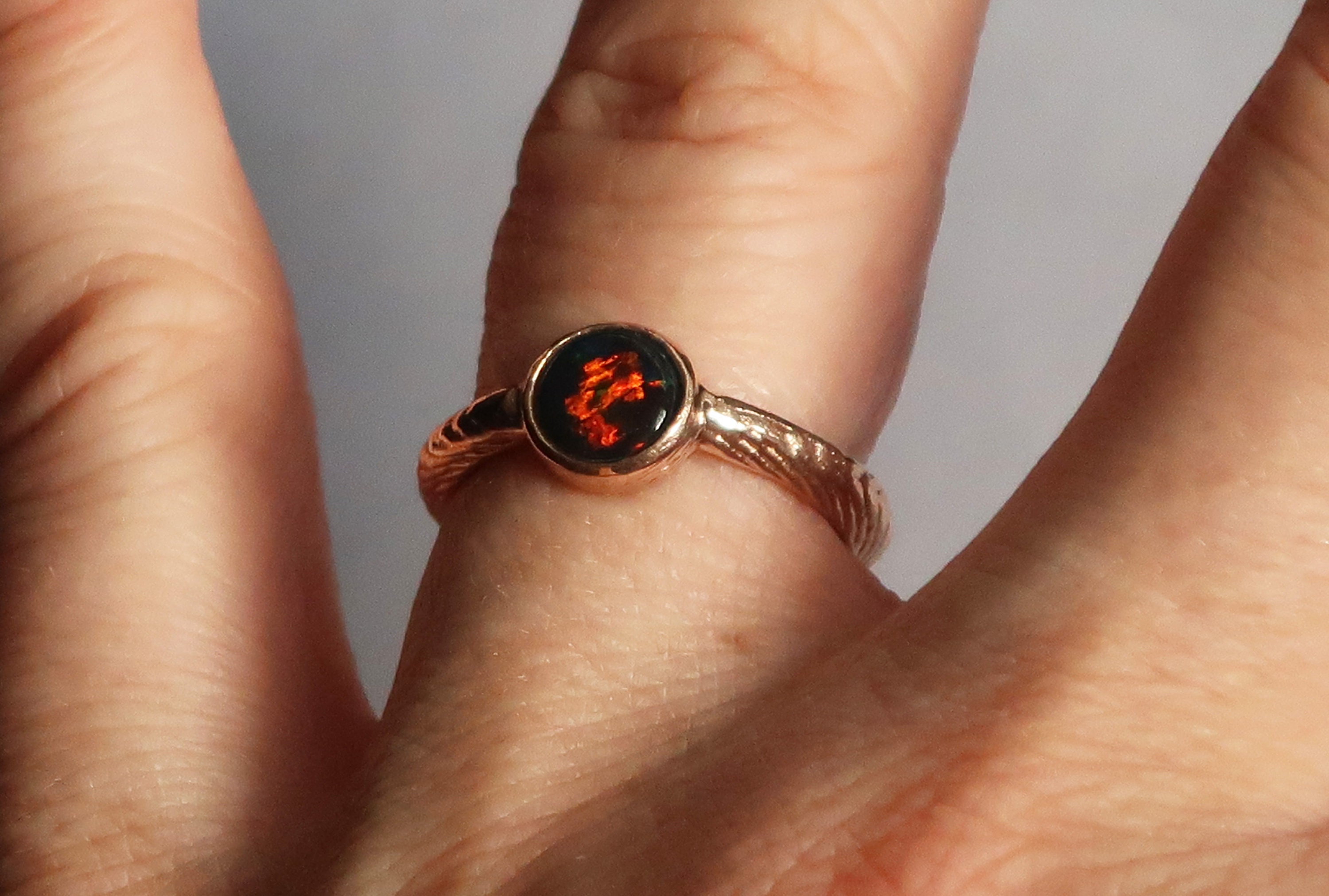 Solid Rose Gold Cuttlefish Cast and Black Opal Solitaire Ring