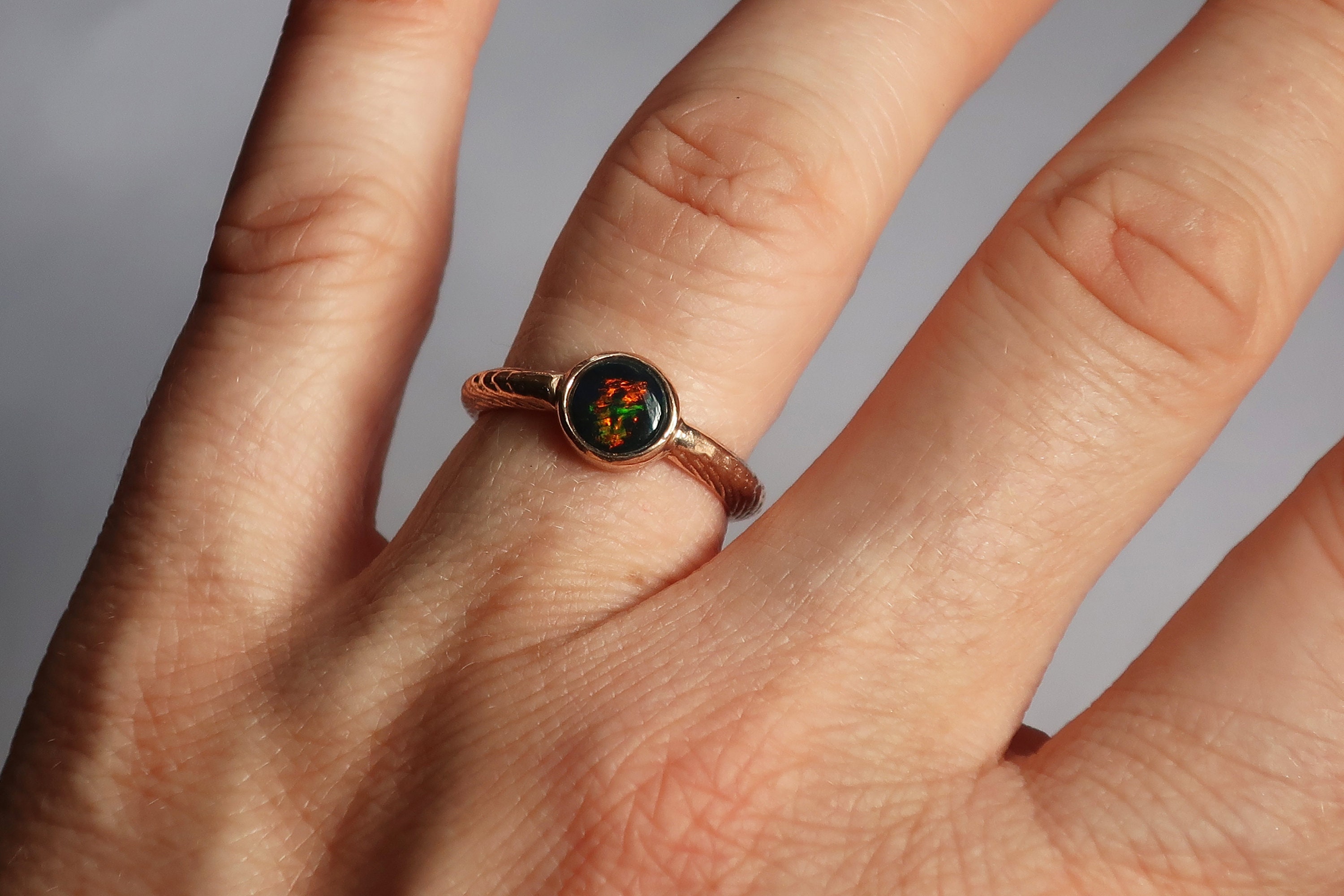 Solid Rose Gold Cuttlefish Cast and Black Opal Solitaire Ring