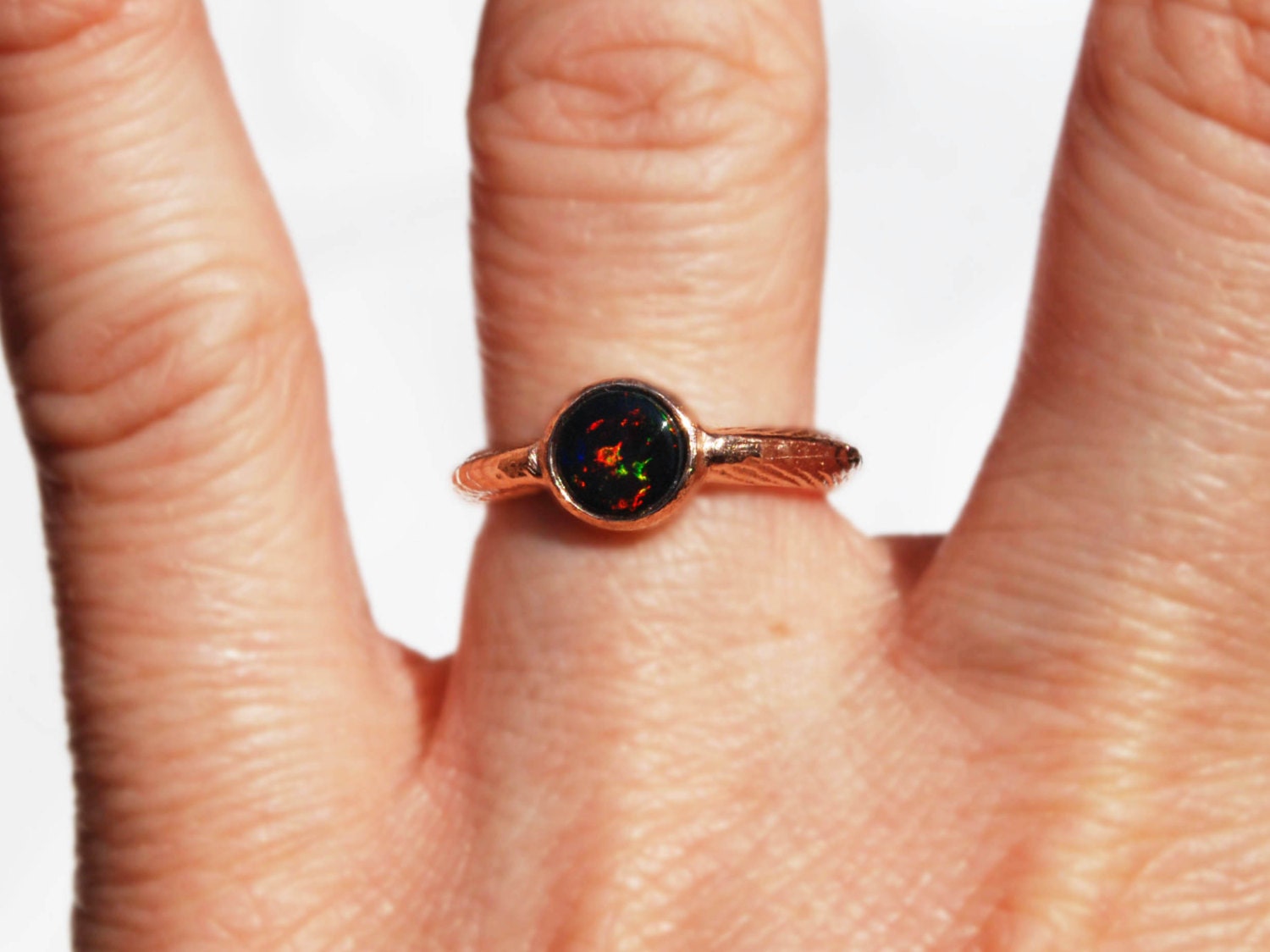 Solid Rose Gold Cuttlefish Cast and Black Opal Solitaire Ring